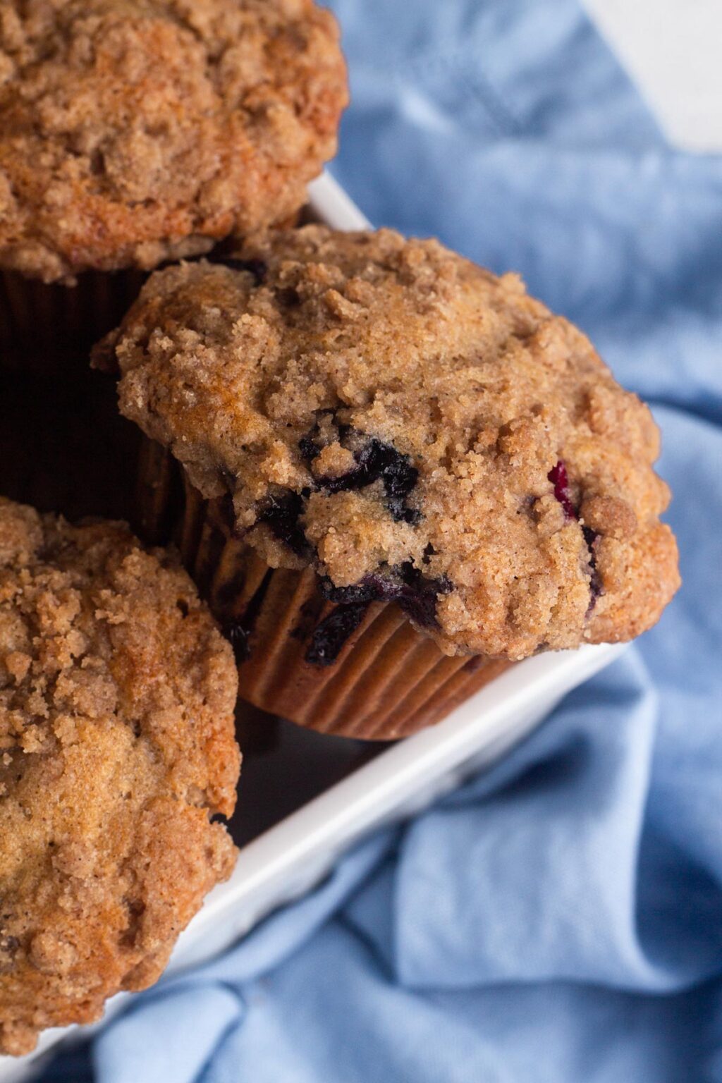 Mixed Berry Muffins with Cinnamon Streusel Topping - Always Eat Dessert